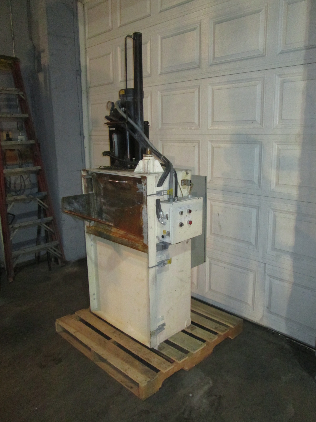 Hydraulic Bag Compactor.